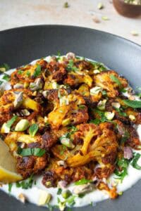 Moroccan Smashed Cauliflower with Garlic Yogurt - Emily Maude Nutrition