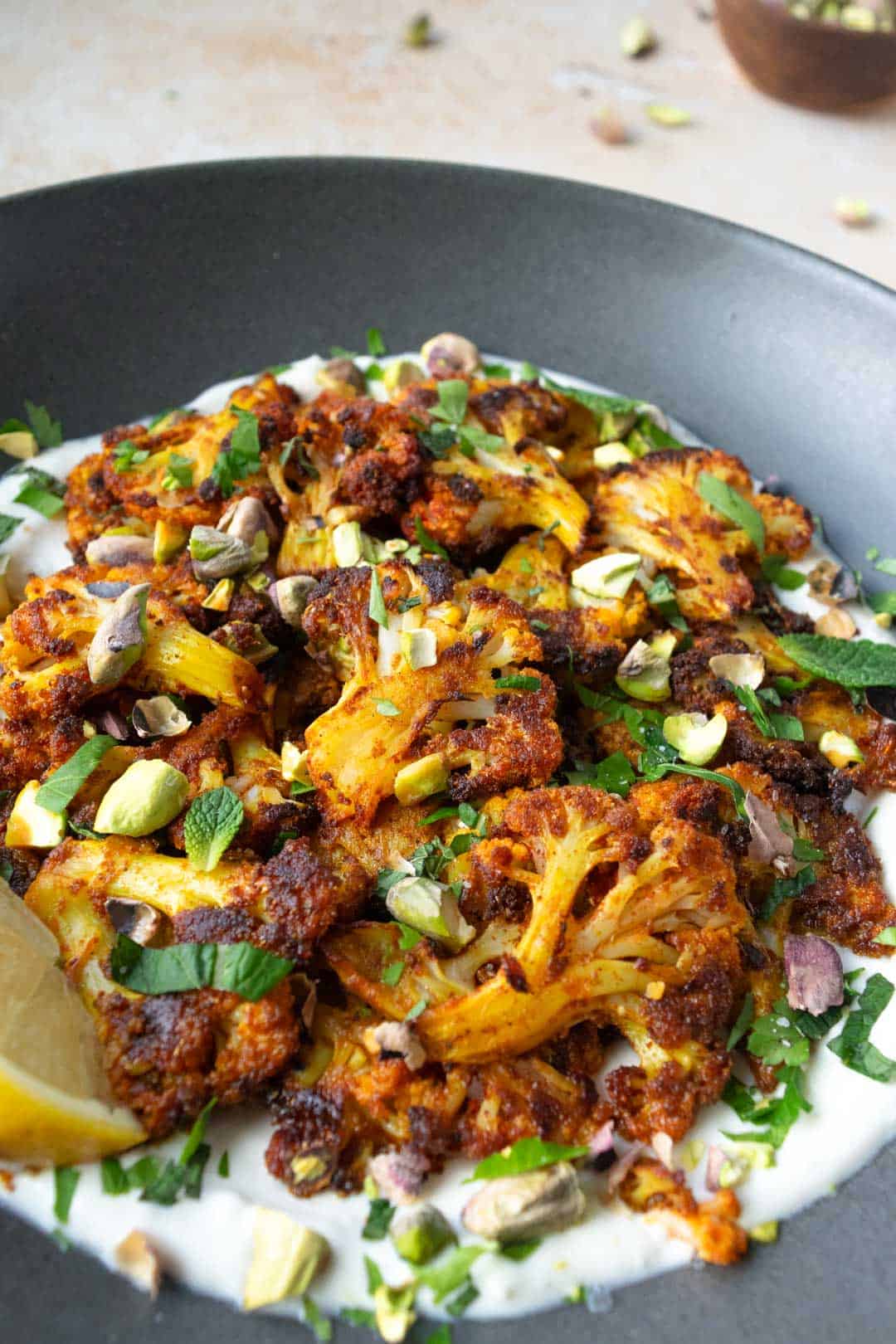Moroccan Smashed Cauliflower with Garlic Yogurt - Emily Maude Nutrition